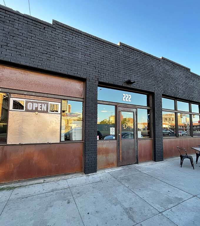 Industrial chic meets pizza perfection at Via Della, where that unassuming storefront hides some serious slice artistry.