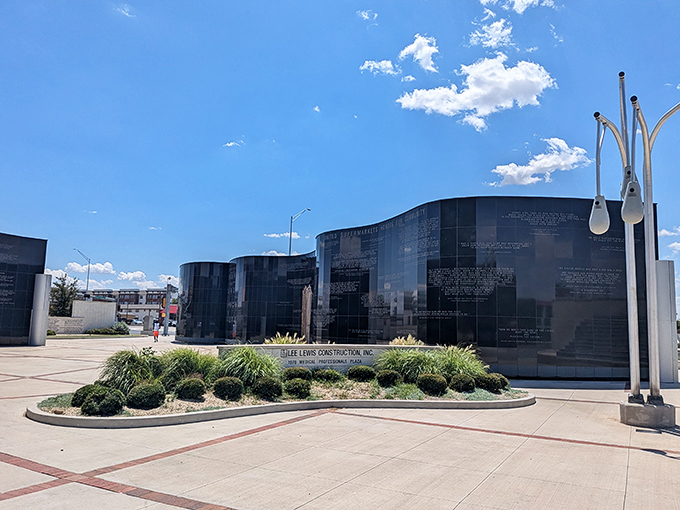 The sleek black memorial walls of the First Responders Plaza offer a moment of reflection amid Lubbock's vibrant cultural landscape.