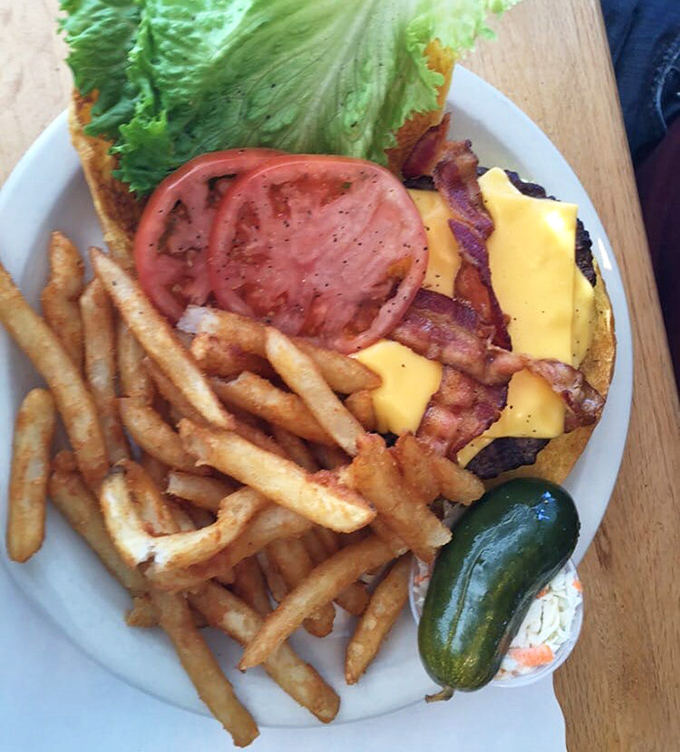 The classic burger, where cheese melts like your resolve to eat healthy, accompanied by fries that demand to be savored one by one.