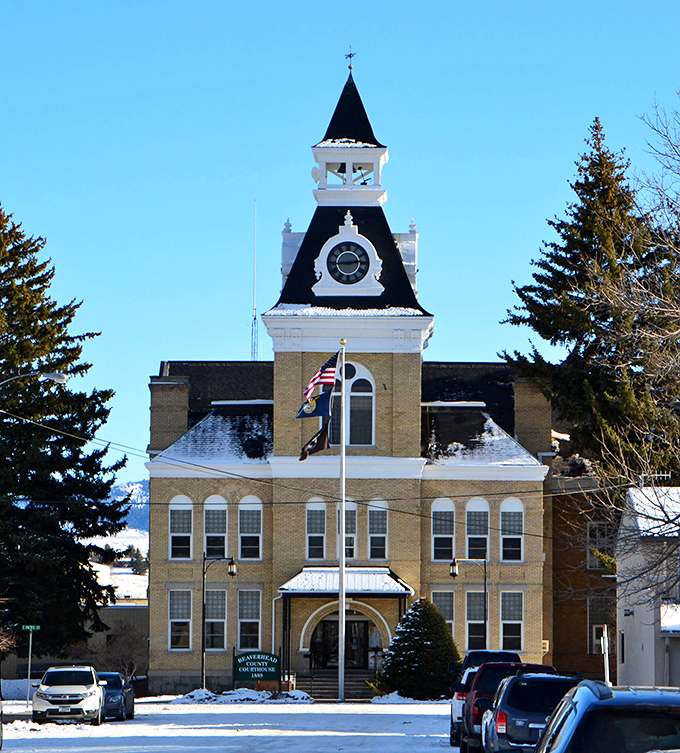 Beaverhead County Courthouse stands proudly in winter dress, its clock tower keeping time for generations of Montanans who've climbed those steps seeking justice or marriage licenses.