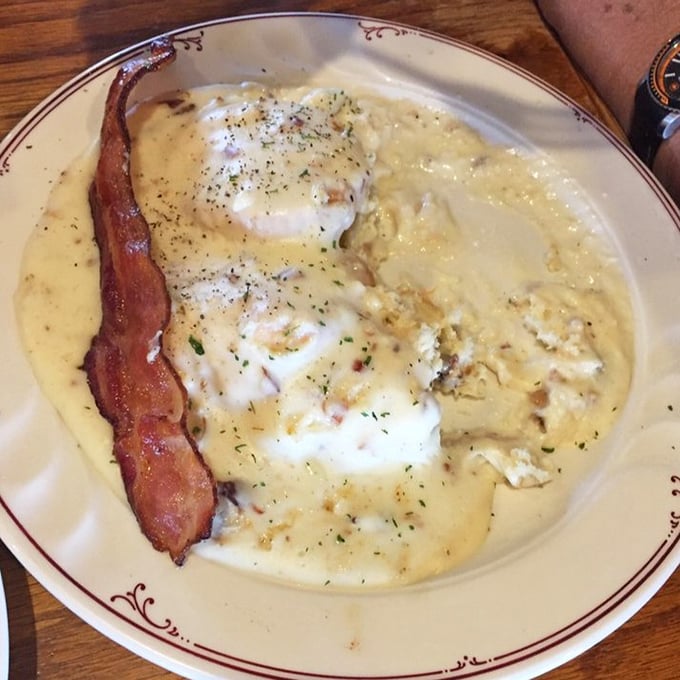 Biscuits and gravy with a side of bacon&mdash;the breakfast equivalent of a warm hug from someone who truly understands what comfort food means.