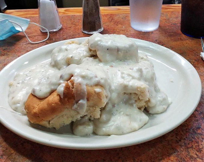 Biscuits and gravy so authentic they deserve their own Southern passport. That creamy blanket of gravy isn't hiding the biscuits&mdash;it's celebrating them.