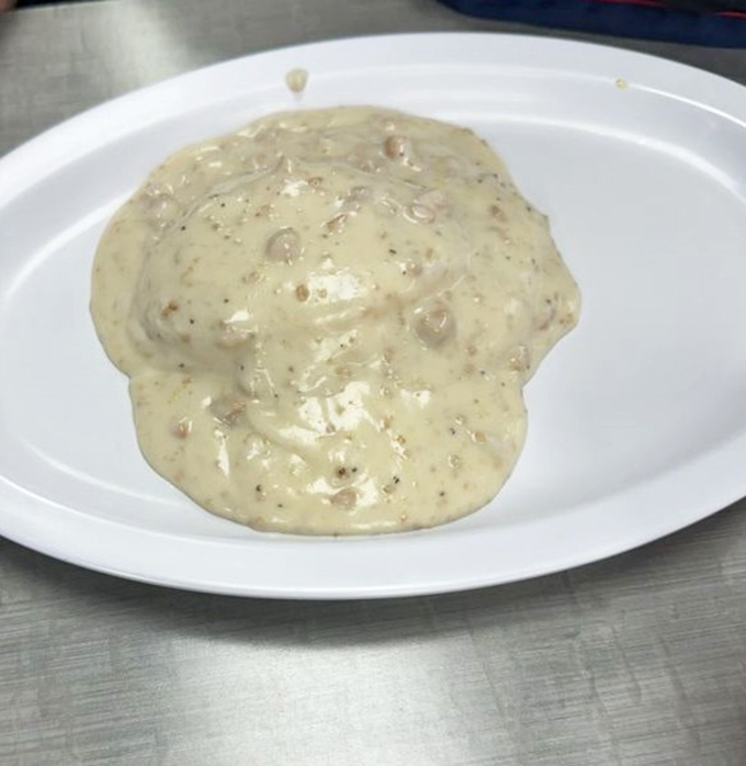 Biscuits and gravy&mdash;the ultimate comfort food litmus test for any breakfast joint. This generous portion of peppery, sausage-studded gravy looks like it passes with flying colors.