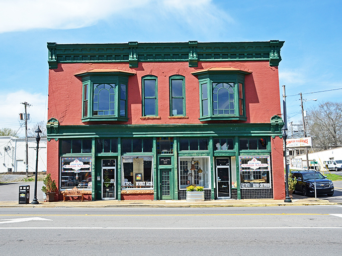 The vibrant red and green Boom Town Makers Market building stands as a colorful invitation to discover local treasures and handcrafted delights.