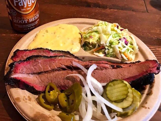 Brisket with a smoke ring so perfect it could be framed. The pink halo is nature's way of saying "you're welcome."