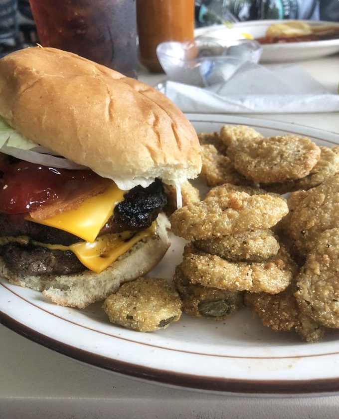 This isn't just a burger &ndash; it's a masterclass in diner perfection, with those fried pickles stealing the spotlight like tasty little scene-stealers.