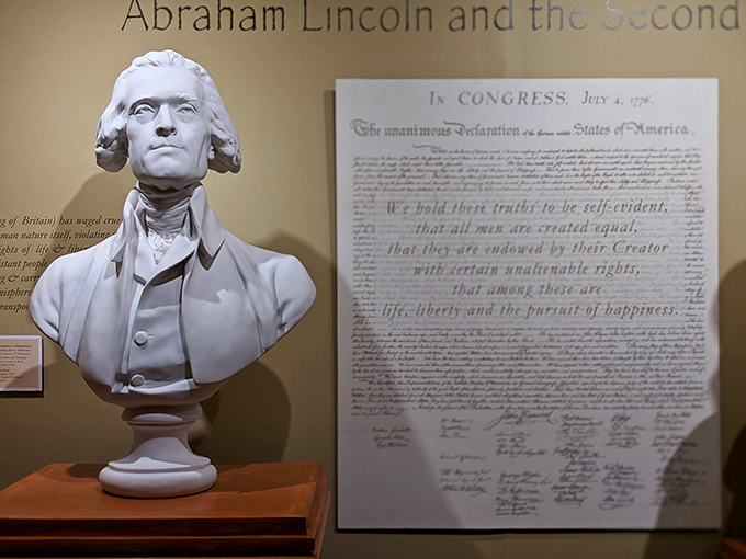 Thomas Jefferson watches over the Declaration's words—a marble reminder that "all men are created equal" still resonates centuries later.