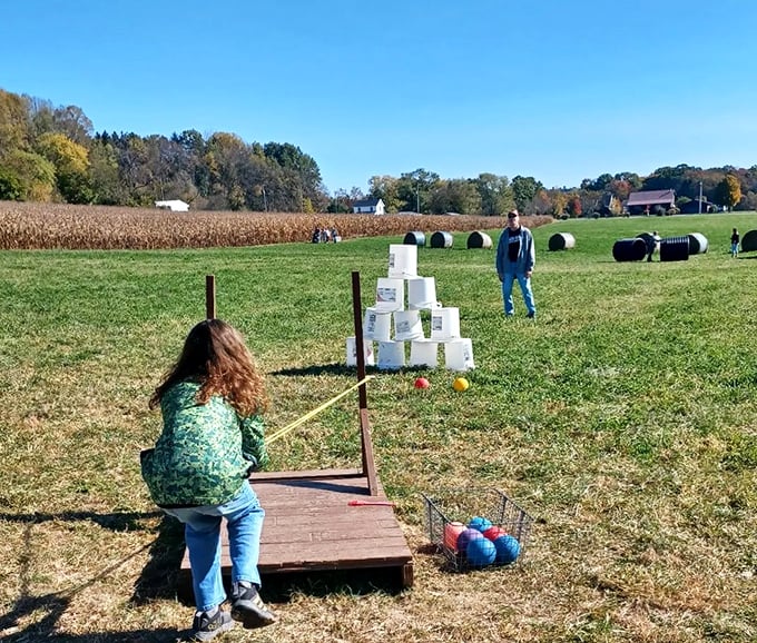 At Cedar Crest Farm, old-fashioned fun comes in the form of bucket bowling—proving entertainment doesn't need batteries or Wi-Fi to be memorable.