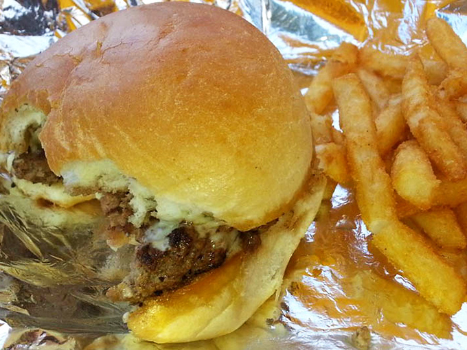 Sometimes paradise is as simple as a perfectly executed burger on a pillowy bun with a side of golden fries.