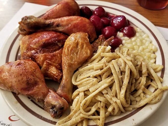 The rotisserie chicken that launched a thousand return visits, served alongside buttered noodles and cranberry sauce &ndash; a trio that feels like a hug from grandma.