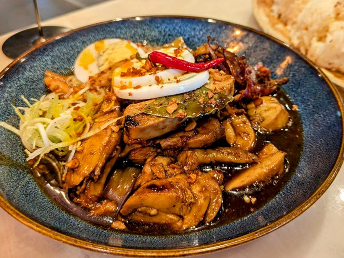 Chicken adobo: where vinegar, soy sauce, and slow-cooking create a dish so deeply flavorful, you'll want to bathe in that sauce. Don't. Just don't.