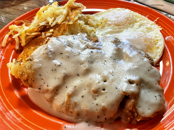 Chicken fried steak smothered in pepper-flecked country gravy that would make a Southerner weep with joy. Diet starts tomorrow.