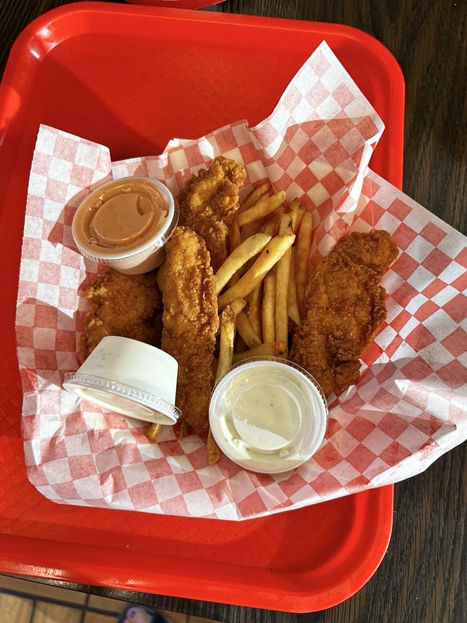 Chicken strips that actually look like they've met a chicken. Served on a red tray that says, "Yes, this is the good stuff."