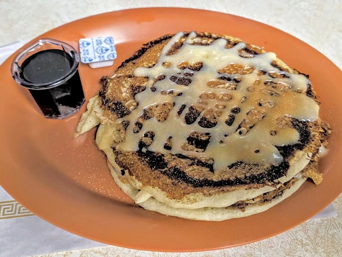 Cinnamon roll meets pancake in breakfast's greatest love story. That drizzle of icing is the happy ending we all deserve.