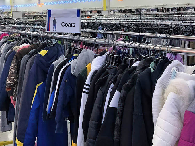 Winter-ready coats hang in organized abundance, proving you don't need to freeze your bank account to stay warm.