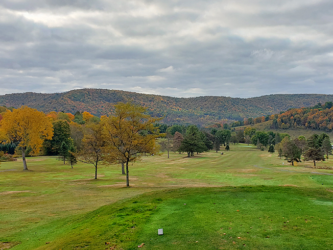 The Country Club's rolling fairways and autumn-touched trees create a golfer's paradise that's more about the view than your scorecard. Even duffers can appreciate this scenery.