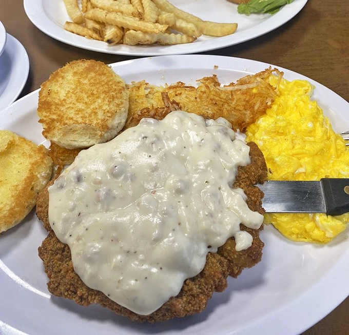 Country fried steak smothered in gravy with eggs and biscuits&mdash;the breakfast equivalent of a warm hug from your Southern grandmother.