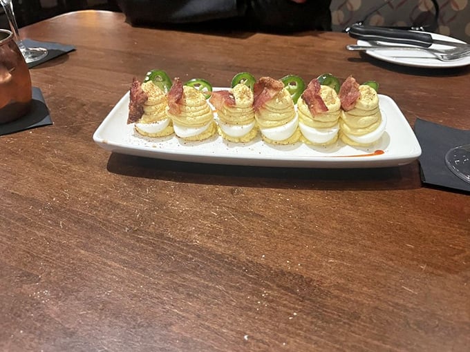 These aren't your grandmother's deviled eggs&mdash;unless your grandmother was secretly a gourmet chef. Stacked with savory toppings that take this picnic classic uptown.