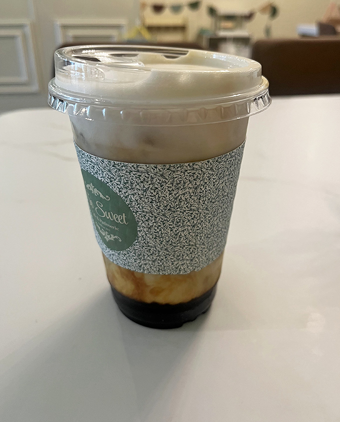 Coffee layered like a sunset in a cup&mdash;the perfect companion for sweet treats and a reminder that beverages here are crafted with the same care as pastries.