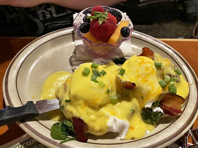 Eggs Benedict that would make the Pope convert to breakfast worship, crowned with hollandaise that's practically liquid sunshine.