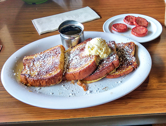 French toast that makes ordinary bread feel inadequate. That butter pat isn't melting&mdash;it's swooning from the deliciousness beneath it.