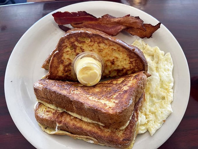 French toast stacked high with a perfect golden crust&mdash;the kind of breakfast that makes you want to applaud the cook.
