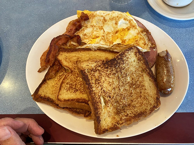 This isn't just breakfast&mdash;it's what breakfast dreams about at night. Toast, eggs, bacon, and sausage: the Mount Rushmore of morning meals.