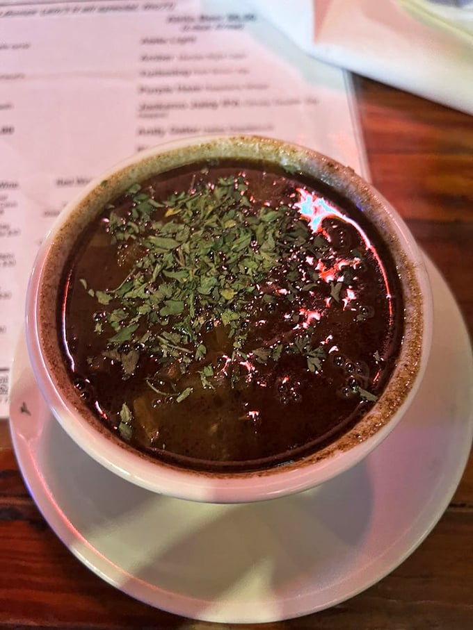 Dark as midnight and twice as mysterious, this gumbo holds secrets that have been passed down through generations of Louisiana cooks.