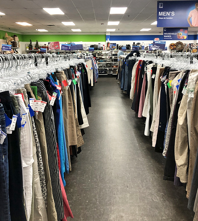Men's clothing organized with military precision&mdash;proof that second-hand shopping doesn't mean sacrificing order or selection.