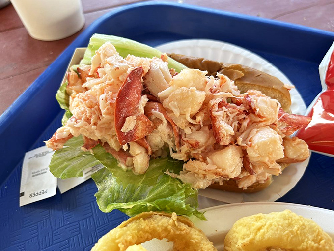 The lobster roll&mdash;where sweet crustacean chunks meet buttery embrace. Like summer vacation in sandwich form, no passport required.