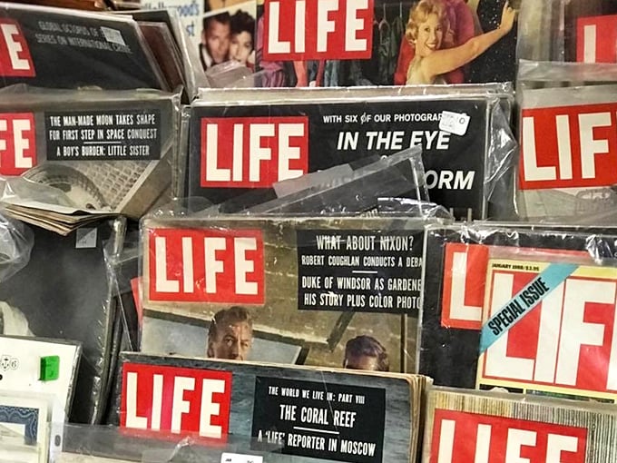 LIFE magazines stacked like a time machine control panel. Want to visit 1960s America? Just pick up an issue and prepare for cultural whiplash.