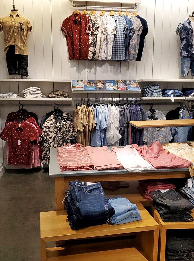 Men's fashion paradise where Hawaiian prints meet classic denim. The rare place where guys voluntarily spend more than fifteen minutes shopping.