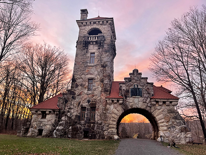 Mohonk's stone gateway tower catches the sunset like nature's own Instagram filter, turning an architectural marvel into something truly magical.