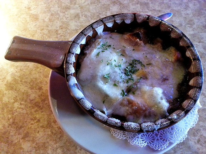 French onion soup that's committed to the cheese pull. The ultimate comfort in a crock, topped with a golden crown of broiled perfection.