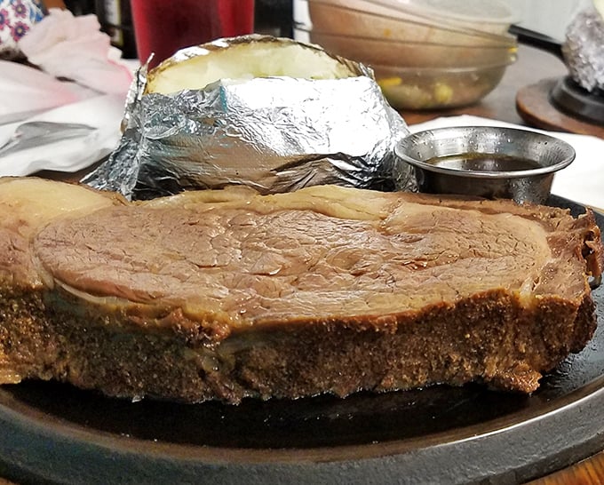 Prime rib that's been slow-roasted to pink perfection—the Sunday dinner of champions that's worth planning your entire weekend around.