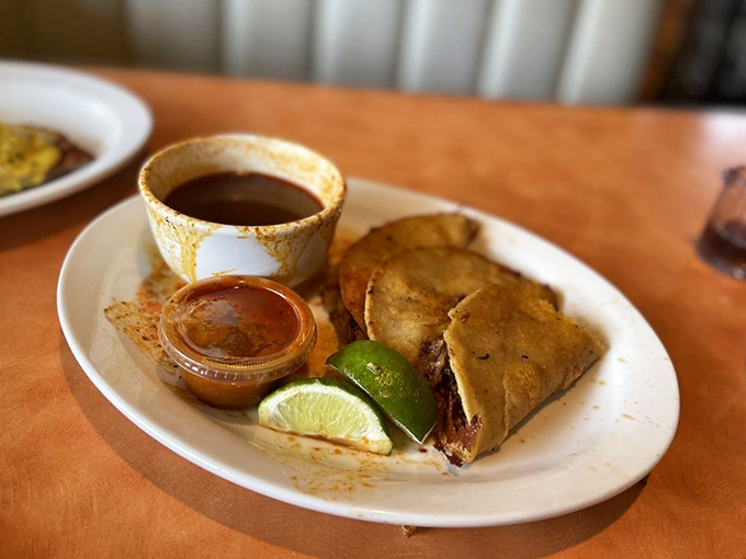 These aren't just quesabirria&mdash;they're edible treasure chests filled with savory fillings, served with the lime wedge that every proper Southwestern dish deserves.