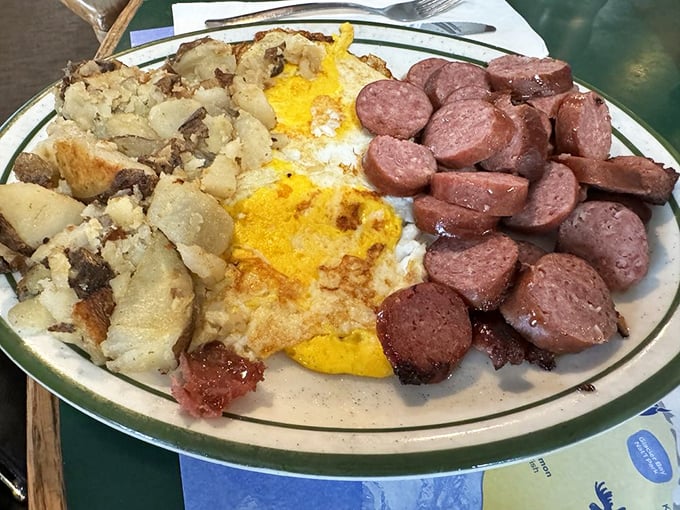 Reindeer sausage that would make Santa nervous shares the plate with sunny eggs and home fries. This is breakfast with a distinctly northern accent.