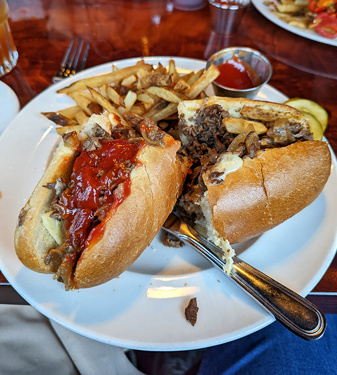 The cheesesteak reimagined&mdash;tender ribeye nestled in a crusty roll with a side of golden fries that would make any Philadelphian nod in approval.