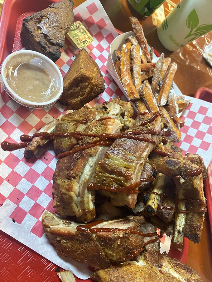 These ribs aren't just falling off the bone&mdash;they're practically jumping onto your fork, accompanied by sides that refuse to be upstaged.