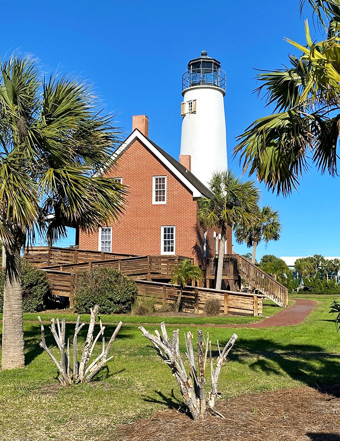 The St. George Island Lighthouse stands sentinel, a postcard-perfect reminder that sometimes the best navigation systems aren't on your smartphone.