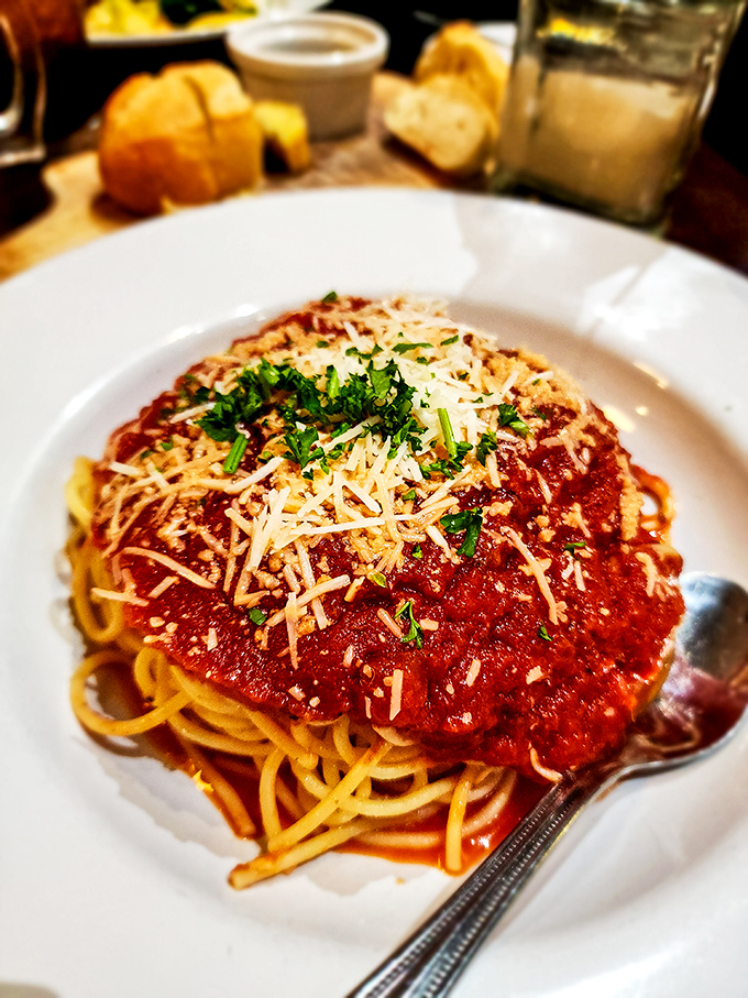 Spaghetti marinara that proves simplicity is the ultimate sophistication, with sauce that tastes like someone's nonna spent all day stirring it.