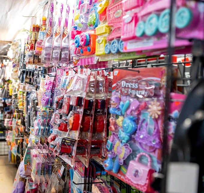 A kaleidoscope of childhood joy hanging in plastic packages—proof that simple toys still compete with screens for kids' attention.