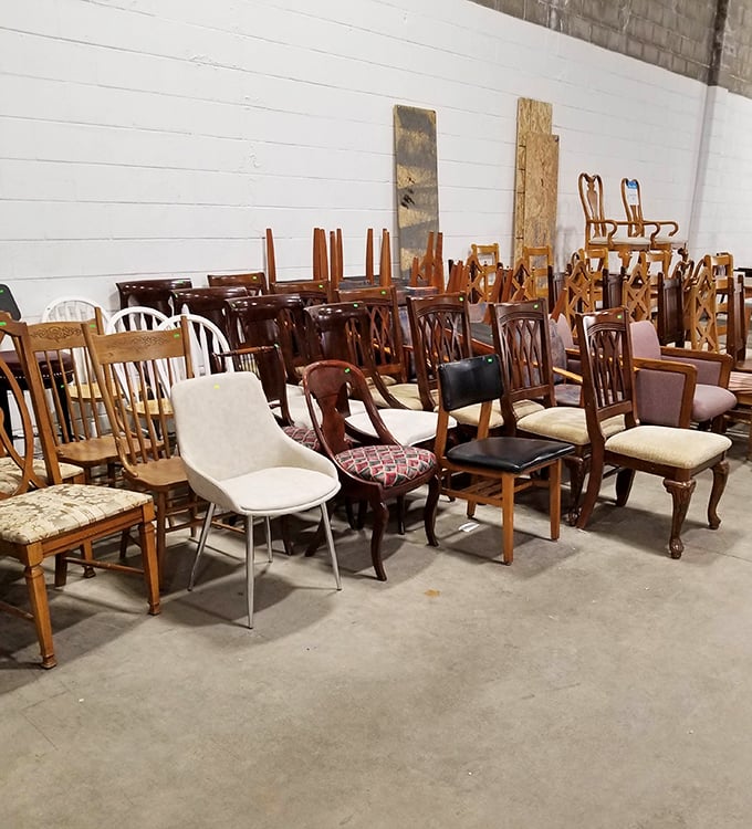 The chair gathering looks like a furniture family reunion where everyone from Grandma's antique rocker to Modern Millie showed up.
