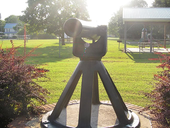 History stands guard in the town park. This vintage artillery piece serves as both playground fascination for visiting grandkids and solemn reminder of sacrifice.