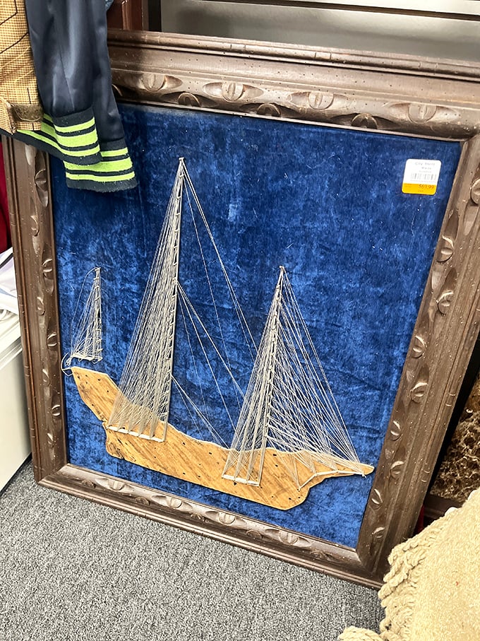 Nautical art that sailed in from someone else's wall and might just find harbor in your guest bathroom. Maritime charm without the seasickness.