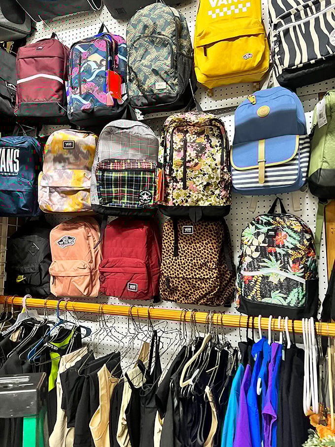 Backpack bonanza! Every style, pattern, and decade represented in this wall of carrying solutions for students, travelers, and everyday adventurers.