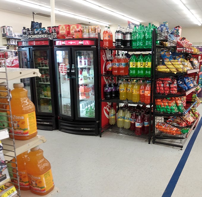 The beverage aisle: where your thirst meets affordable satisfaction. Those refrigerator doors might as well be portals to refreshment paradise.