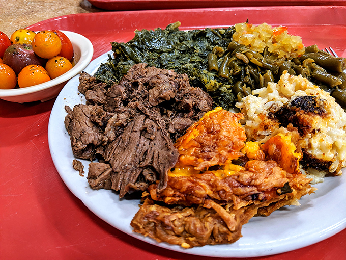 A plate that tells Nashville's food story better than any guidebook: slow-cooked meats and vegetables that have clearly been introduced to pork along the way.