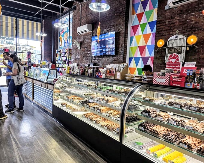 The chocolate counter&mdash;where willpower goes to die and "I'll just have one piece" becomes the day's biggest fiction.