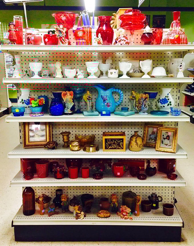 Color-coordinated glassware and collectibles stand at attention like soldiers in a particularly fabulous army, each piece with stories to tell.